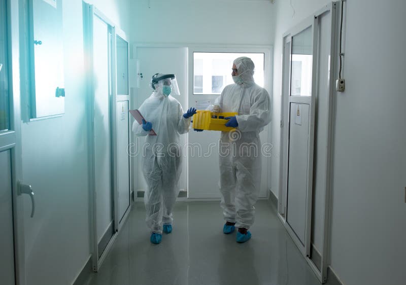 Biologist Carrying Samples in Protective Suits Stock Image - Image of ...