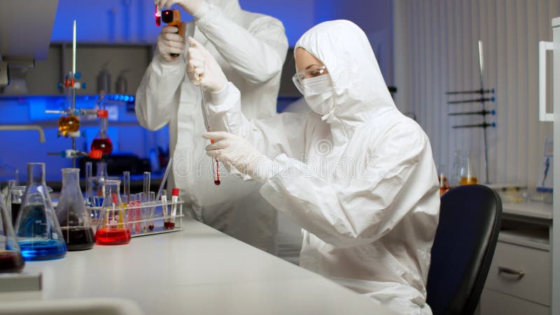 Biologist Examining a Virus Sample in Laboratory Stock Image - Image of ...