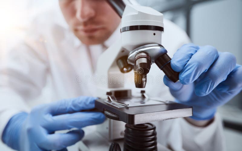 Biologist Explores the Substance Under the Microscope Stock Image ...