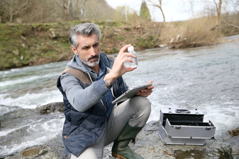 Biologist with Biology Students Testing River Water Stock Image - Image ...