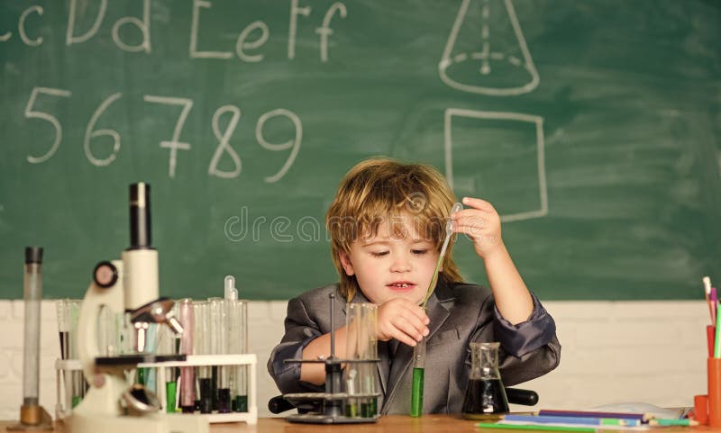 Biology Science. Science Experiments with Microscope in Lab. School Kid ...