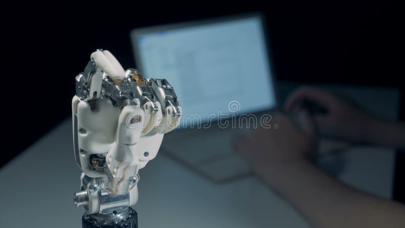 Bionic Hand with Moving Fingers is Getting Controlled from a Computer ...