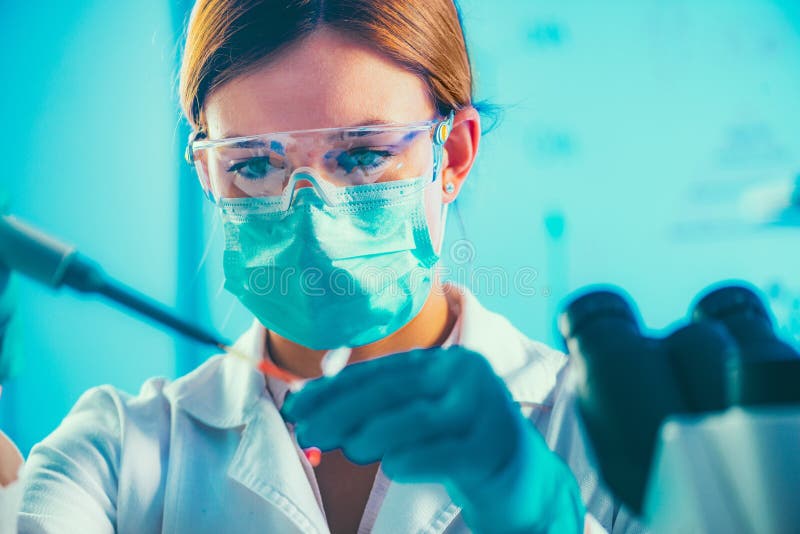 Biotechnology. Female Scientist Working in Laboratory Stock Photo ...