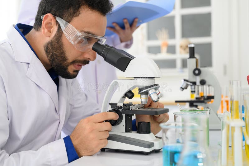 Biotechnology Researcher is Using a Microscope in the Lab Stock Photo ...