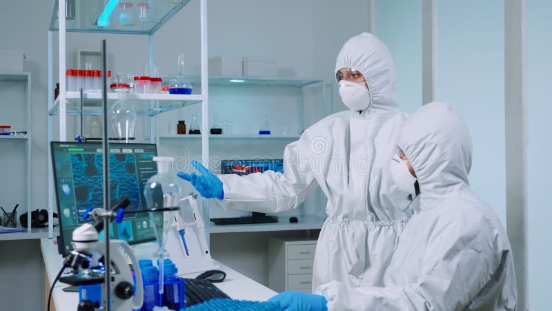 Biotechnology Scientist Wearing Ppe Suit Researching Stock Photo ...