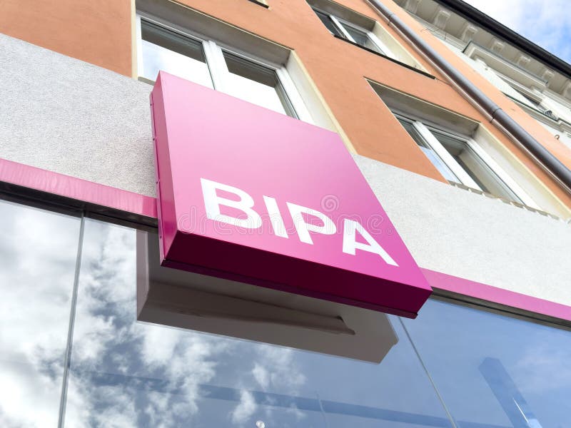 Bipa Storefront with Pink Signage and Reflection of Sky on Windows ...