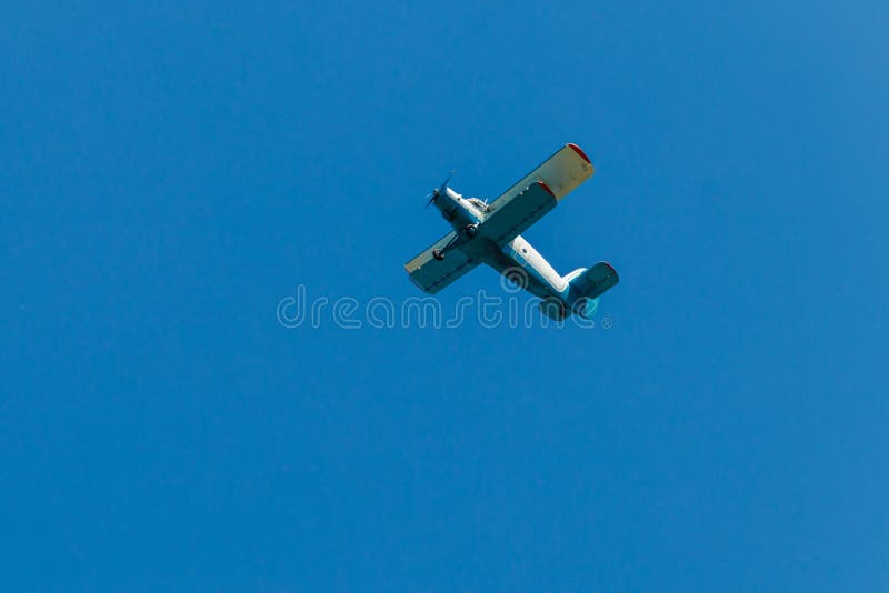 Biplane flying in sky stock image. Image of demonstration - 164610415