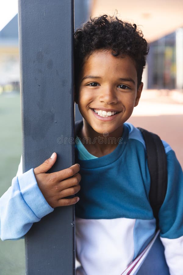 Biracial Boy Smiles at School, with Copy Space Stock Photo - Image of ...