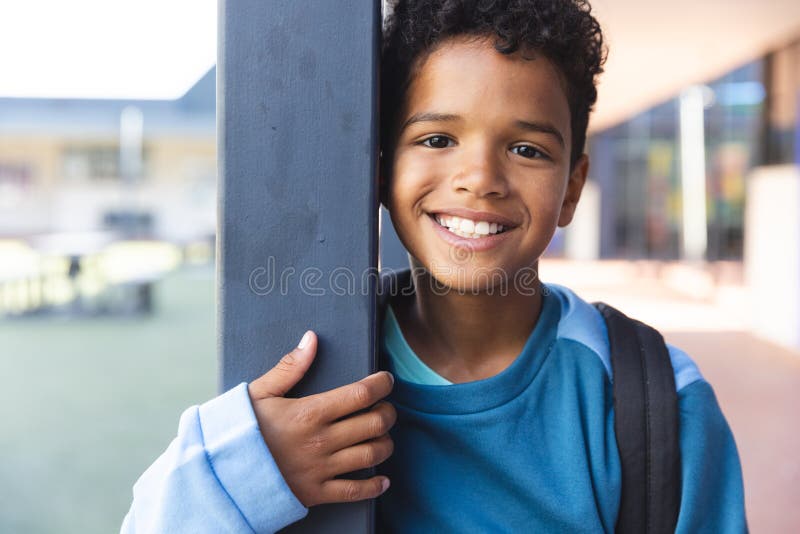 Biracial Boy Smiles Brightly at School Stock Image - Image of education ...