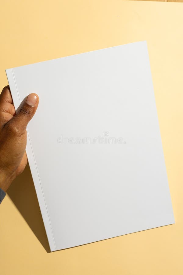 Biracial Man Holding a Blank White Paper, with Copy Space Stock Photo ...