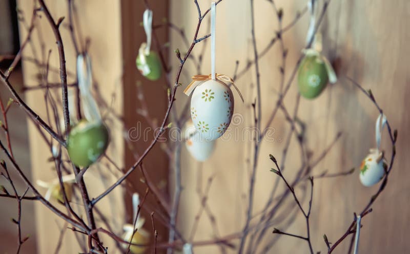 Birch Branches Decorated with Easter Eggs in White and Green Colors ...