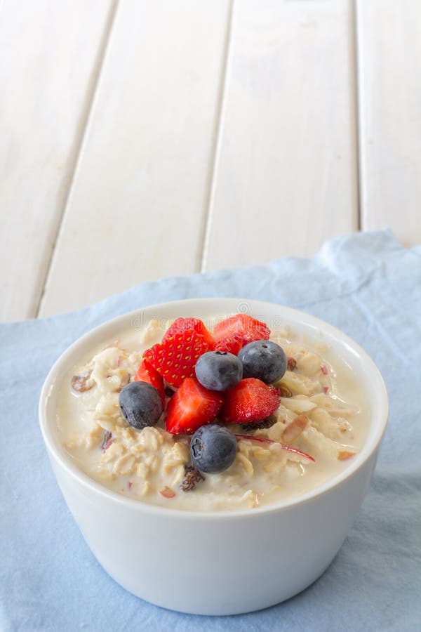 Bircher Muesli with Berries Vertical Stock Image - Image of treat ...