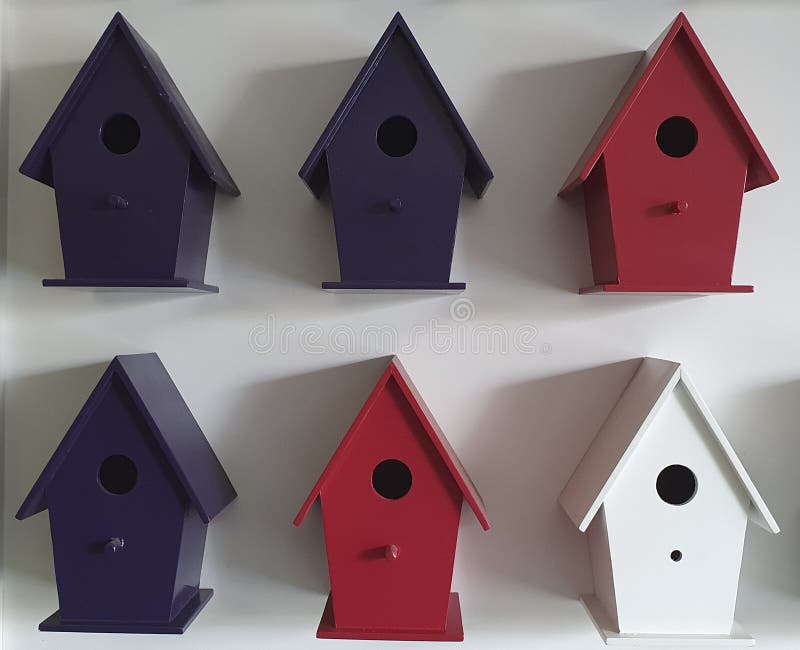 6 Bird Boxes in Different Colors Hang on White Background Stock Image ...