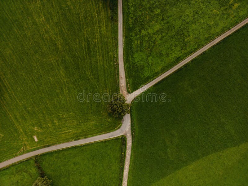 A Bird - Eye View of an Intersection in a Grass Area Stock Photo ...