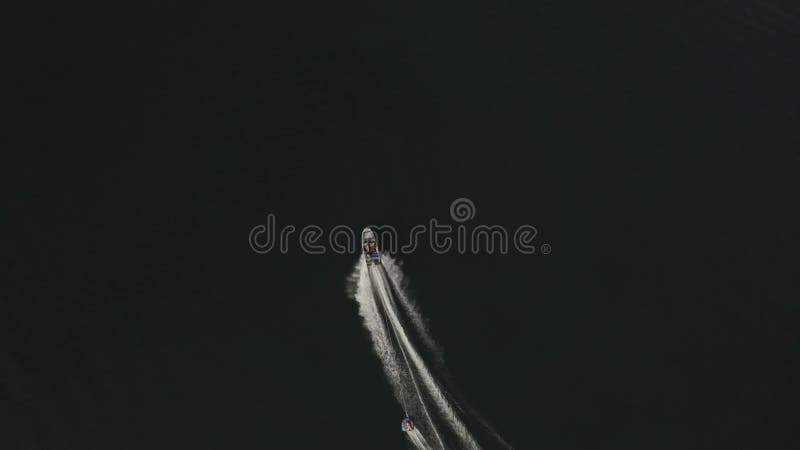 Bird Eye View of Speedboat with Wake on a Dark Water Stock Footage ...