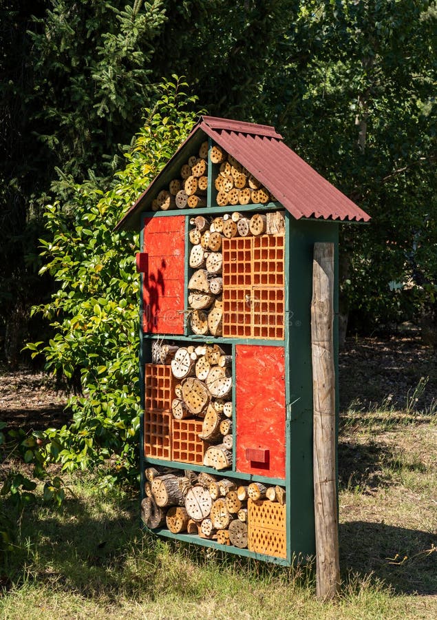 Bird and Insect Hotel Made from Tree Trunks, Bricks and Other Items ...