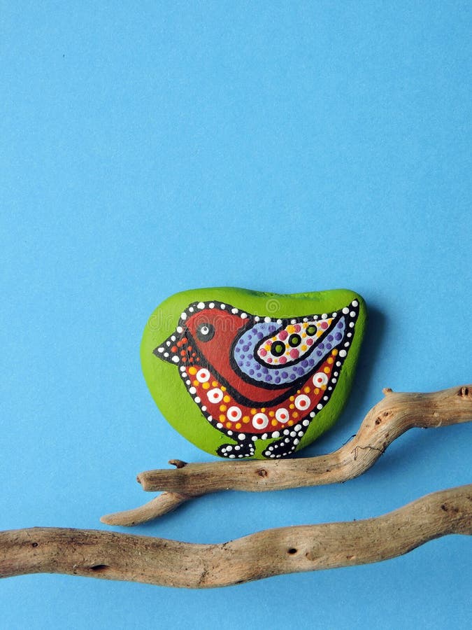 Bird painted on stone stock photo. Image of texture, paint - 50053322