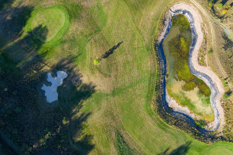 A golf course from above stock photo. Image of pond - 196698150