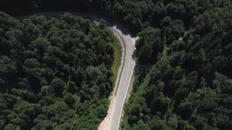 A Bird S Eye View of a Person Riding a Motorcycle on an Empty Road ...