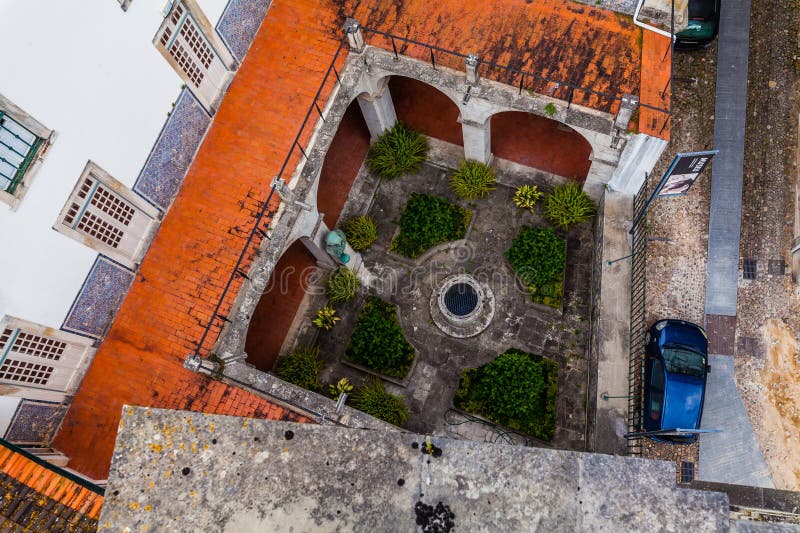 A Bird S-eye View of a Secluded Courtyard with a Central Fountain Stock ...