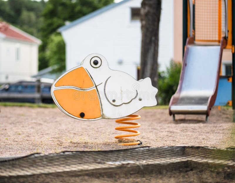 Bird Spring Rider on a Playground.. Editorial Stock Photo - Image of ...