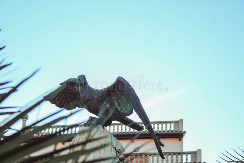 Bird Statue in Front of Gate of the City Wall in Alcudia, Mallorca ...