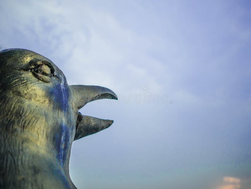 Bird statue and sky stock photo. Image of beak, avian - 122783004