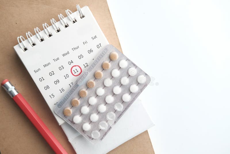 Birth Control Pills , Calendar and Notepad on Table Stock Image - Image ...