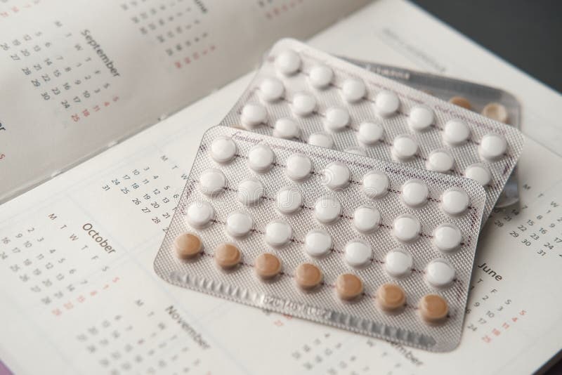 Birth Control Pills , Calendar and Notepad on Table Stock Image - Image ...
