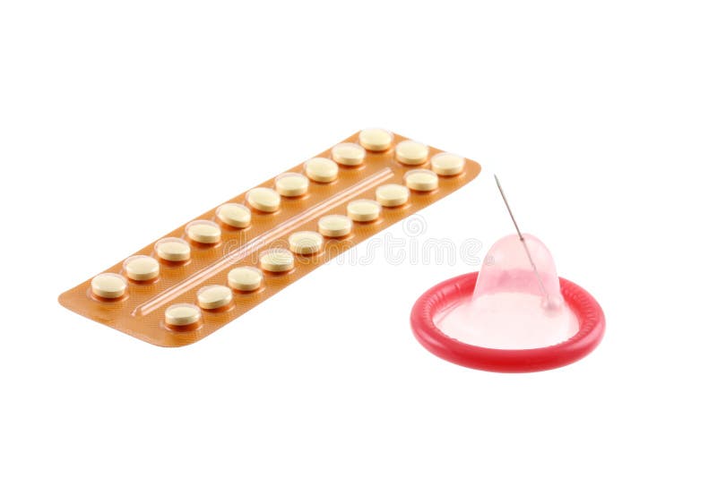 Birth Control Pills and a Condom with a Pinhole Stock Photo - Image of ...