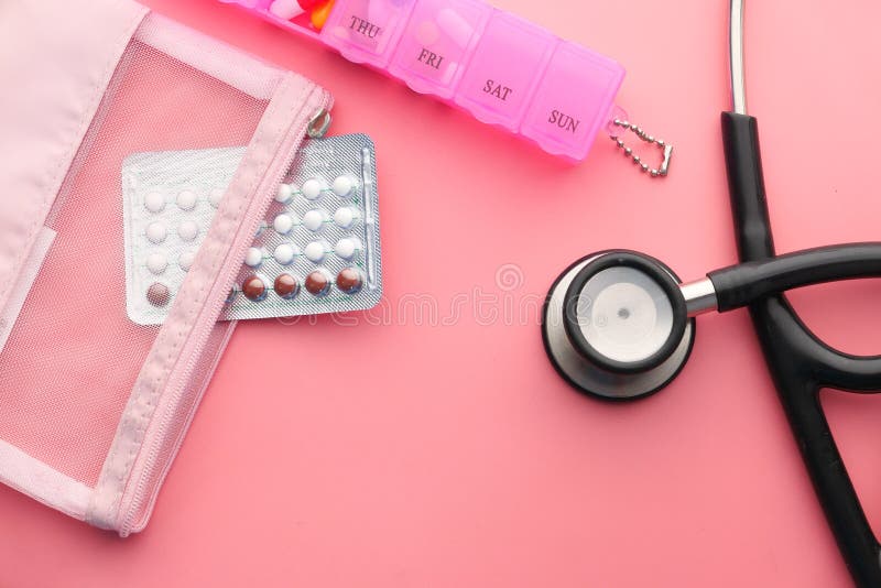 Birth Control Pills and Stethoscope on Pink Stock Image - Image of ...