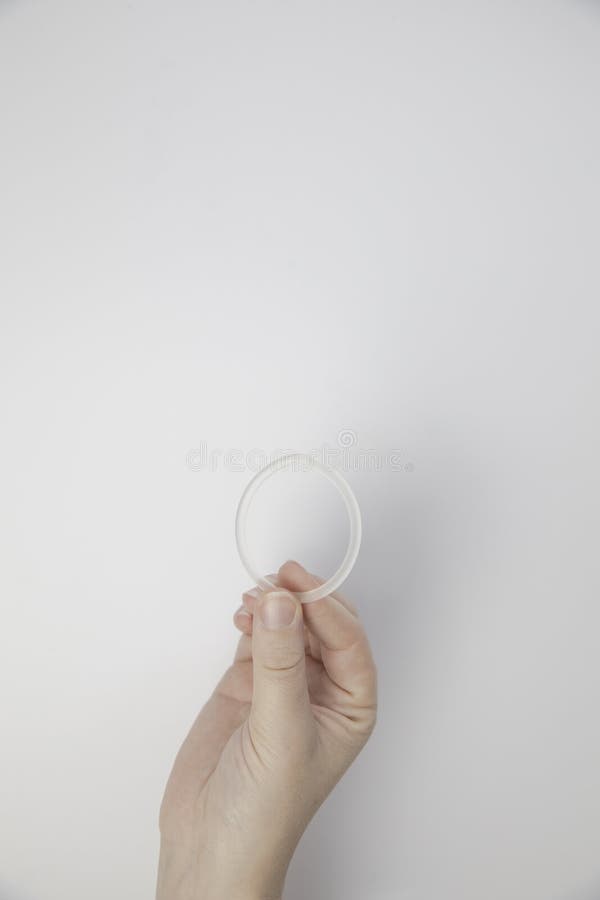 Birth Control ,hormone, Contraception Ring in a Womans Hand Isolated on ...