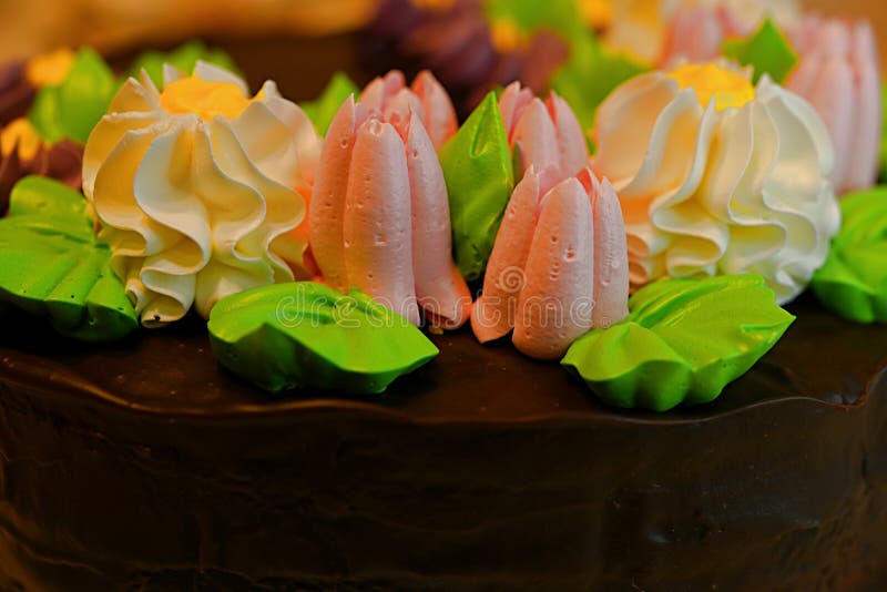 Birthday Cake in Chocolate Icing with Cream Flowers Stock Photo - Image ...