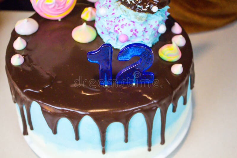 Birthday Cake Decorated with Candles, Ice-cream and Number 12 Stock ...
