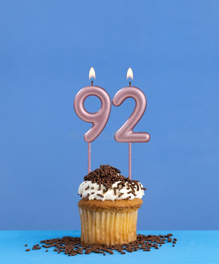 Birthday Candle with Cupcake on Blue Background - Number 92 Stock Photo ...