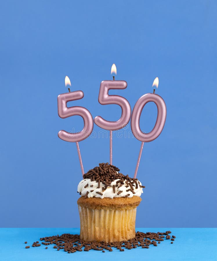 Birthday Candle with Cupcake on Blue Background - Number 550 Stock ...
