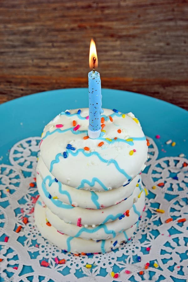 Birthday Candle on Sugar Cookie Stack Stock Image - Image of pile, lace ...