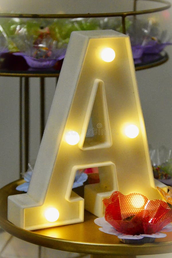 Letter a with Lights Decorating Candy Table Stock Image - Image of ...
