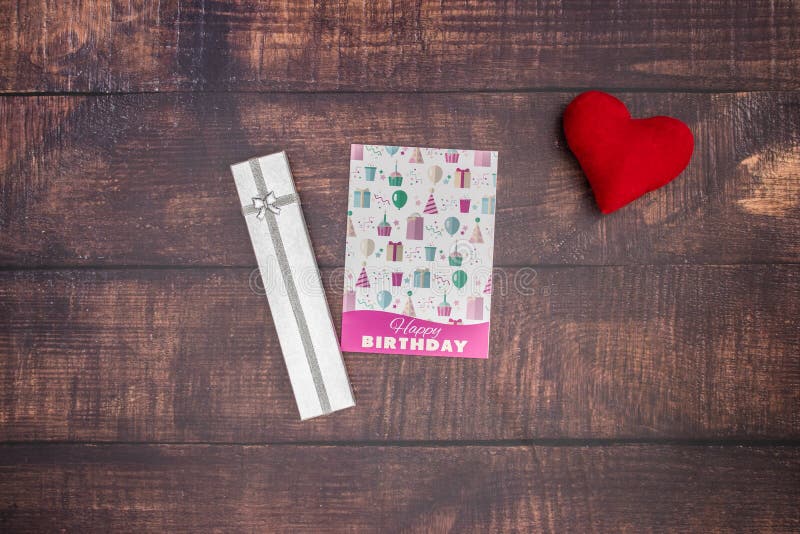 Birthday Card Present and Red Heart on Wooden Table Stock Image - Image ...