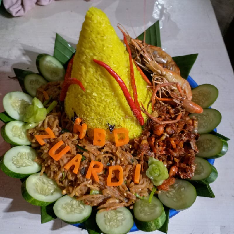 Birthday Celebration with Yellow Rice Stock Photo - Image of food, rice ...