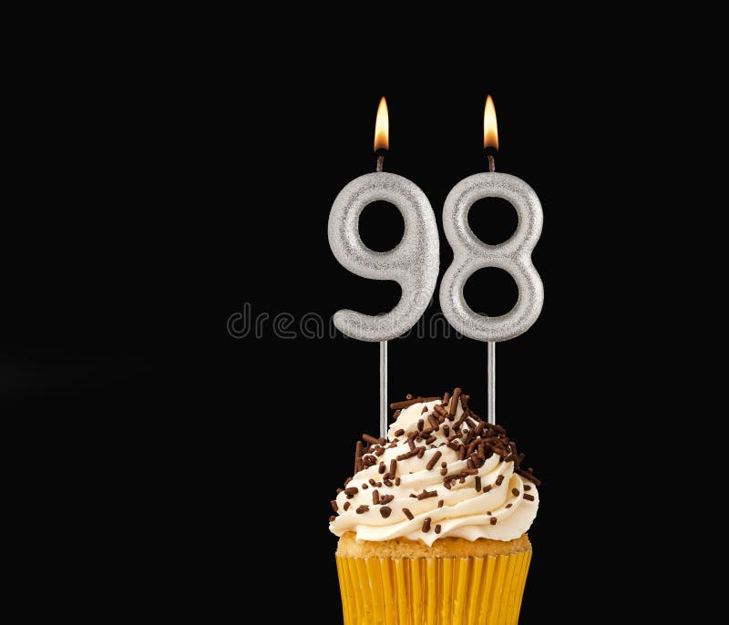 Birthday Cupcake on Black Background - Number 98 Shaped Candles Stock ...