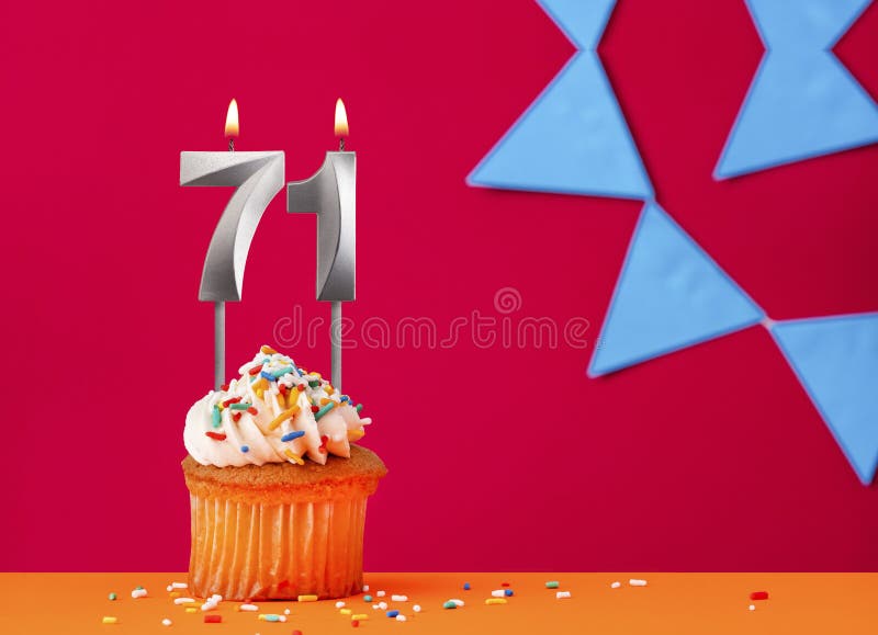 Birthday Cupcake with Candle Number 71 on a Red Background with Blue ...