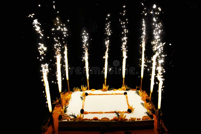 Birthday Fruit Cake with Fireworks Candles Stock Photo - Image of ...
