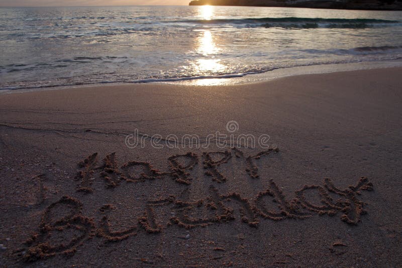 Birthday Greeting Written in the Sand Stock Photo - Image of words ...