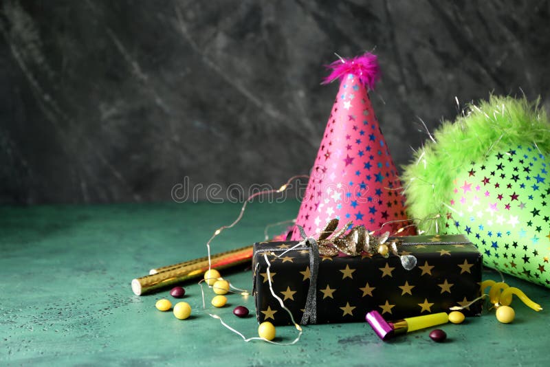Birthday Party Items with Gift Box on Table Stock Photo - Image of food ...