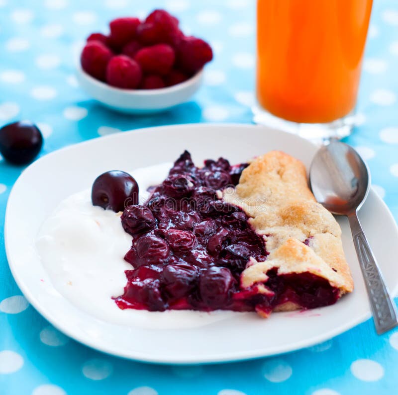 Biscuit with Cherries and a Glass of Juice Stock Photo - Image of ...