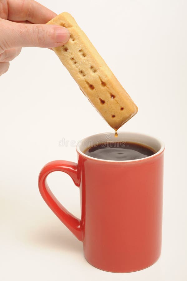 Biscuit dunking stock photo. Image of dunking, coffee - 26635608