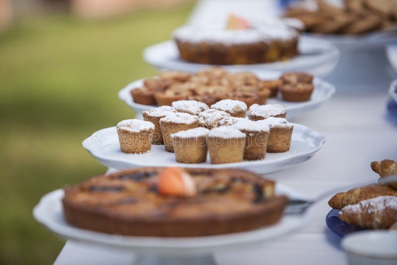 Biscuits and Cakes on a Table Stock Photo - Image of confection, green ...