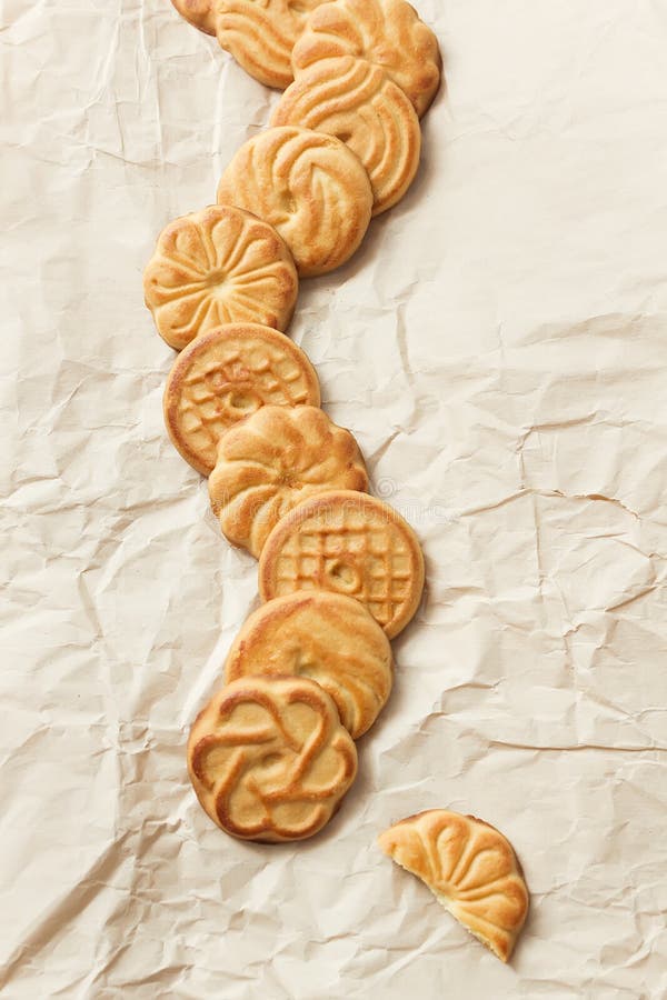 Biscuits on a Crumpled Paper Stock Photo - Image of snack, selective ...