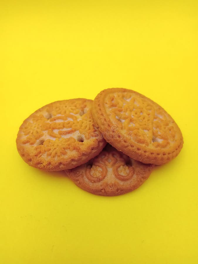Biscuits with Unique Texture and Yellow Background Stock Photo - Image ...